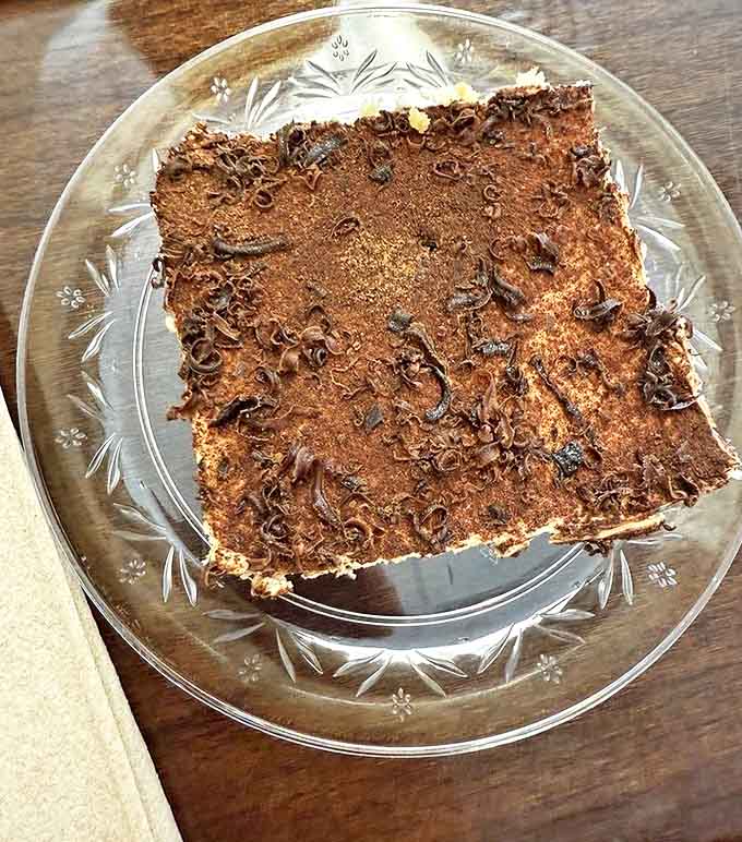 Coffee-soaked ladyfingers and mascarpone cream playing a delicious duet that puts most orchestras to shame.