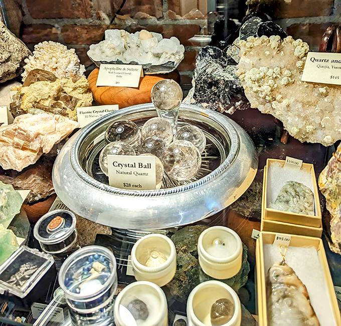 Crystal treasures gleam in display cases, offering both beauty and metaphysical possibilities to visitors exploring Bellows Falls' eclectic shops.