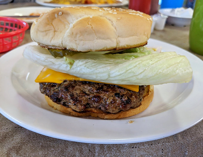 Even the burger gets special treatment here – a hand-formed patty, melted cheese, and fresh vegetables on a perfectly toasted bun. No fancy aioli needed when quality speaks for itself.