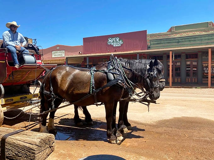 Horse-drawn carriages still clip-clop down Allen Street, offering rides that connect visitors to the primary mode of transportation during Tombstone's silver boom days.
