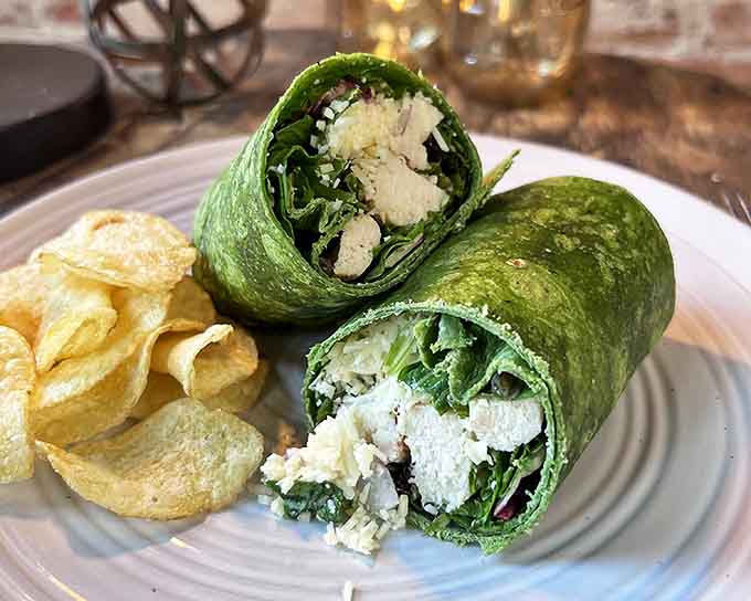 Wrapped in vibrant green, this chicken Caesar isn't just lunch &ndash; it's a portable feast that makes desk eating feel almost civilized.