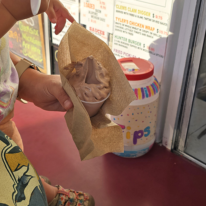 Chocolate ice cream nestled in brown paper &ndash; simple packaging for a complex flavor experience that makes grown adults smile like children.