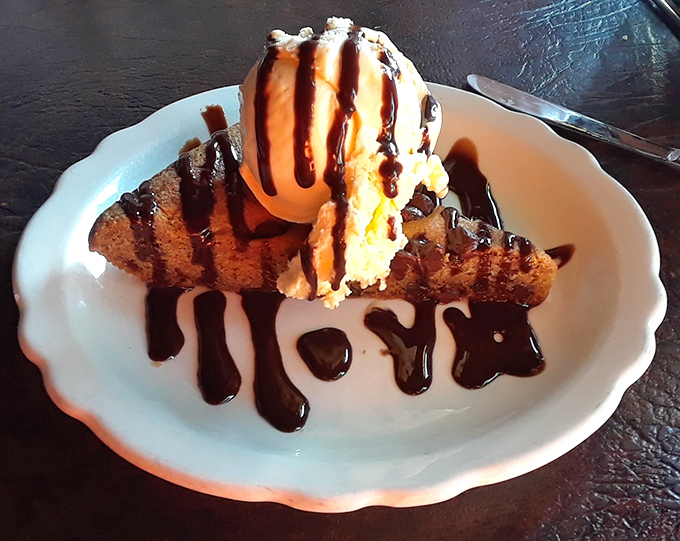 Dessert here isn't an afterthought – this warm brownie with ice cream and chocolate drizzle provides the sweet finale every great meal deserves.