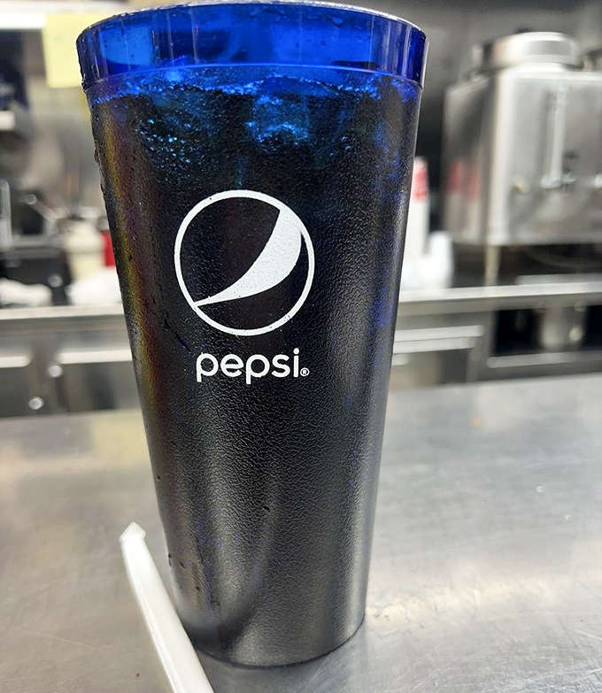 That blue Pepsi cup isn't just holding soda &ndash; it's holding decades of diner tradition in one frosty vessel.