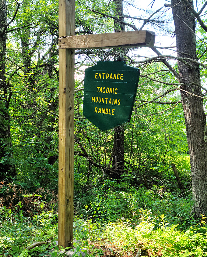 The unassuming entrance sign welcomes hikers to the Taconic Mountains Ramble, promising adventures that live up to its evocative name.