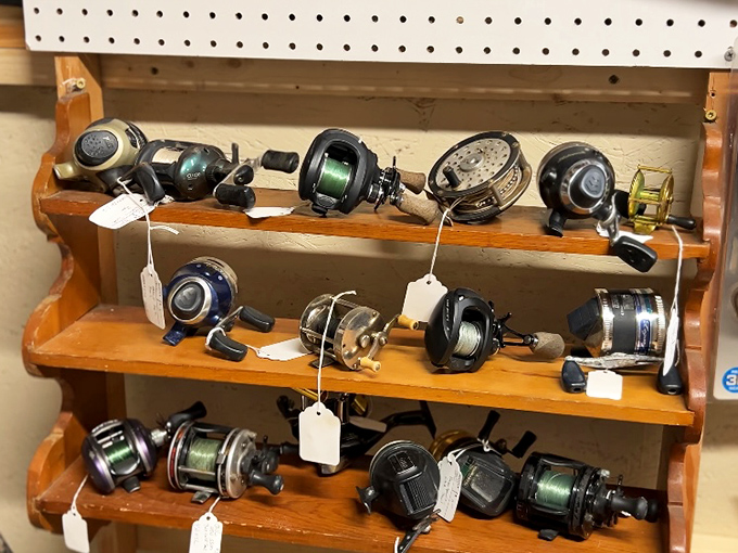 Vintage fishing reels line up like soldiers, each one holding tales of "the one that got away" from anglers long ago.