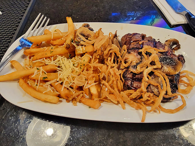 These aren't just fries&mdash;they're crispy, golden accomplices to a perfectly grilled steak, topped with mushrooms and crispy onion straws.