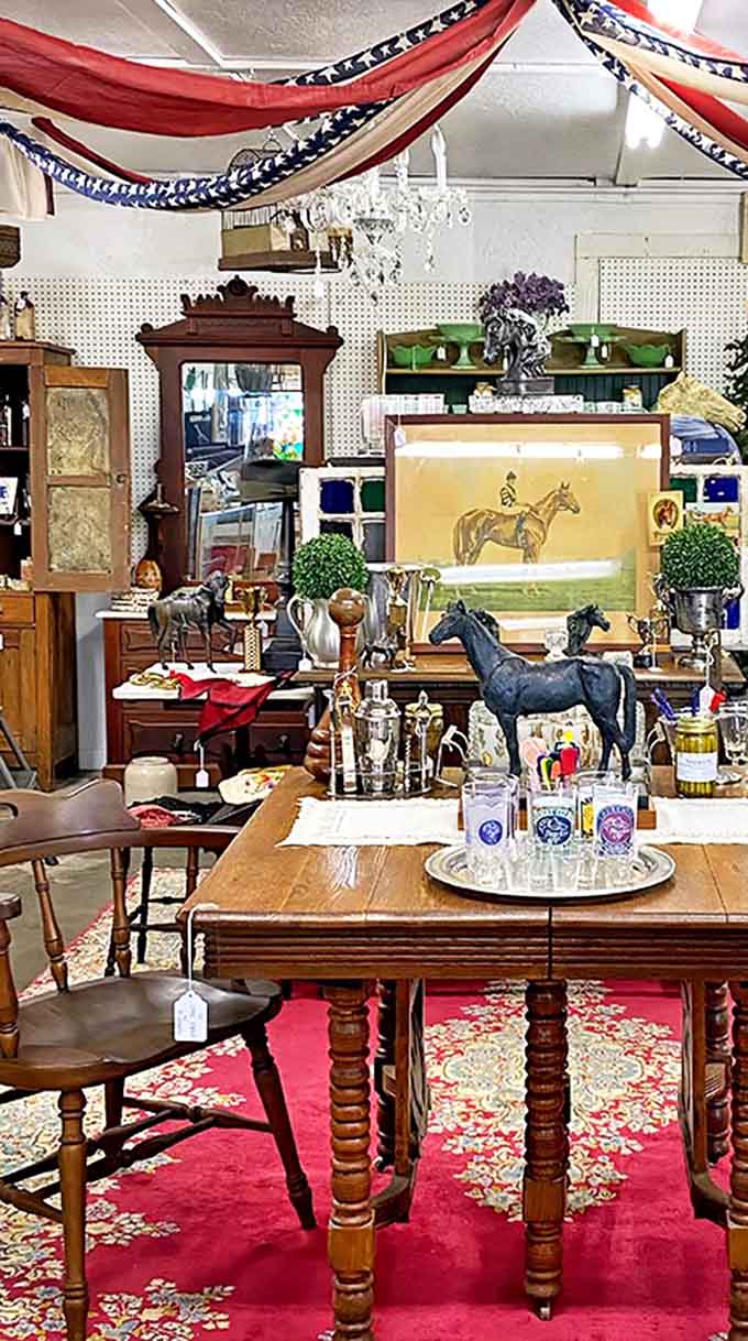 Patriotic bunting and vintage Americana create a nostalgic tableau that feels like stepping into a Norman Rockwell painting—only everything's for sale!