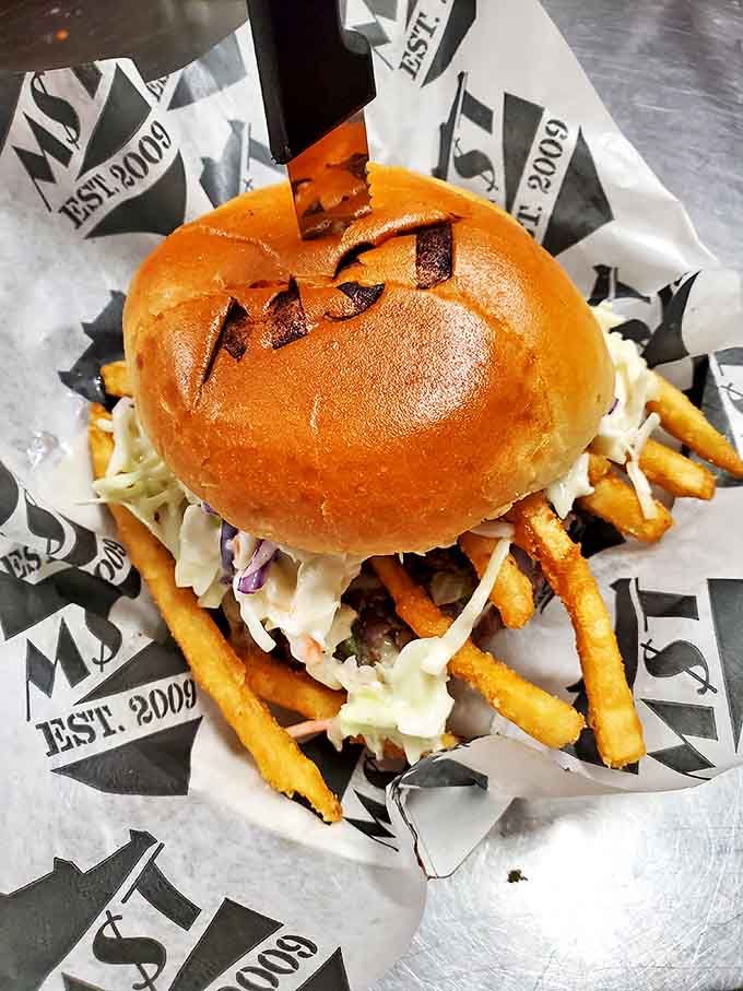 This isn't just a burger &ndash; it's an architectural achievement with crispy fries playing a supporting role.