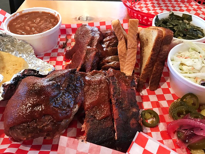 Barbecue nirvana: a tray loaded with perfectly smoked meats, pickles, and sides that showcase Smokey Mo's mastery of the pit.