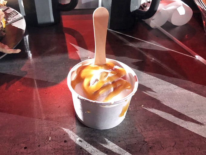 A simple cup of vanilla ice cream becomes a royal treat when you're wearing a paper crown and watching knights battle.