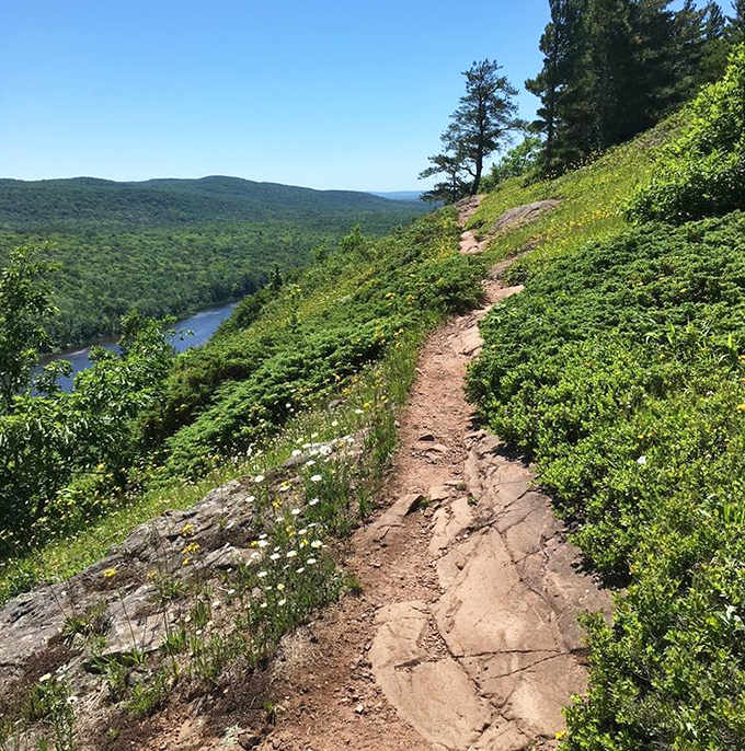 Narrow trails hug the mountainside, offering hikers heart-stopping views with every step &ndash; just watch your footing while gawking at that scenery!