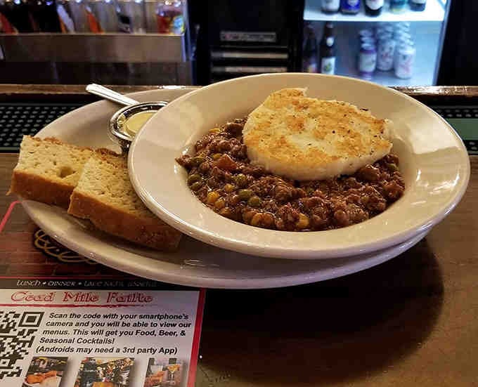 Steam rises from this shepherd's pie like a warm invitation &ndash; the golden-brown potato crust promising textural magic with each forkful.
