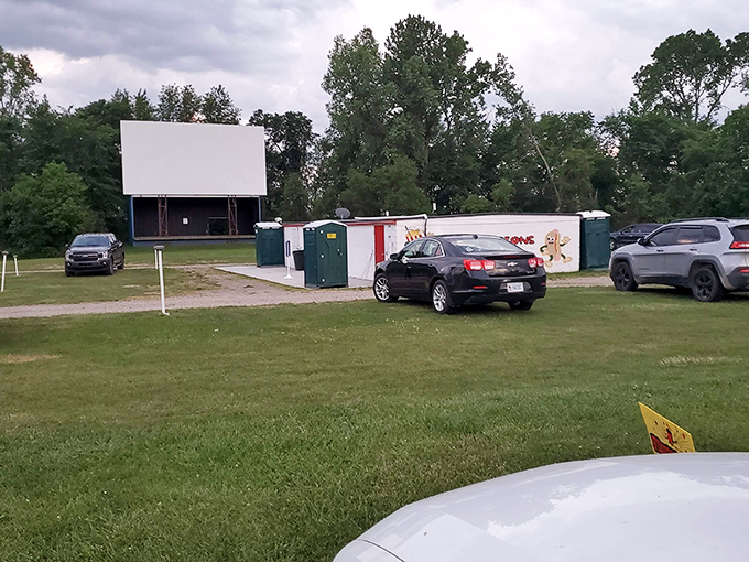 The Hi Way Drive Inn's screen stands tall against an open sky, ready to bring movie magic to Carson Ville's small-town audience.