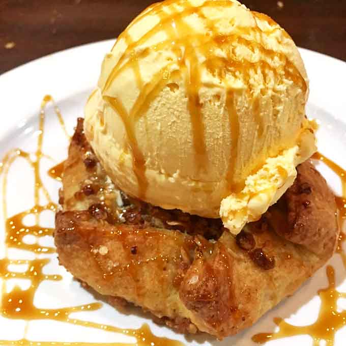 This pumpkin and sweet potato tart topped with gelato is autumn on a plate, minus the leaf raking.