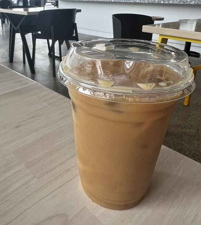 Iced coffee perfection in a cup, ready to fuel your cupcake consumption with caffeinated enthusiasm.