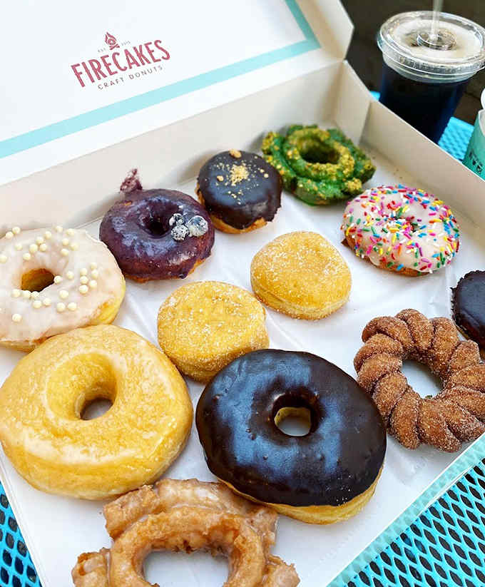 This assortment looks like a dessert museum exhibition where every piece deserves its own spotlight and enthusiastic applause.