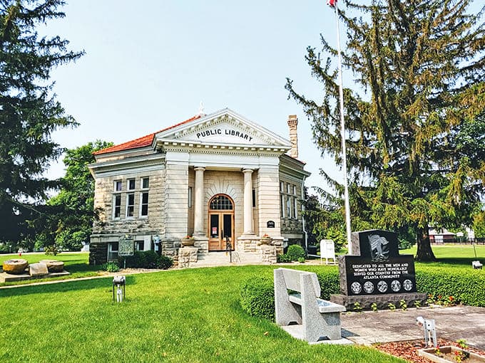 The historic Atlanta Public Library offers architectural beauty and literary treasures just steps away from the hot dog-wielding giant.