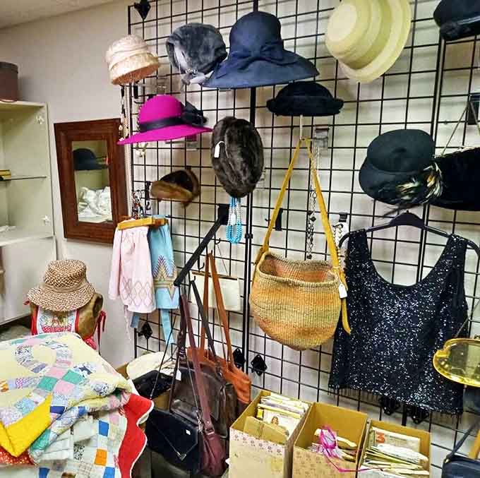 Vintage hats and bags hang in suspended animation, waiting for modern adventures while carrying the essence of fashion's golden eras.