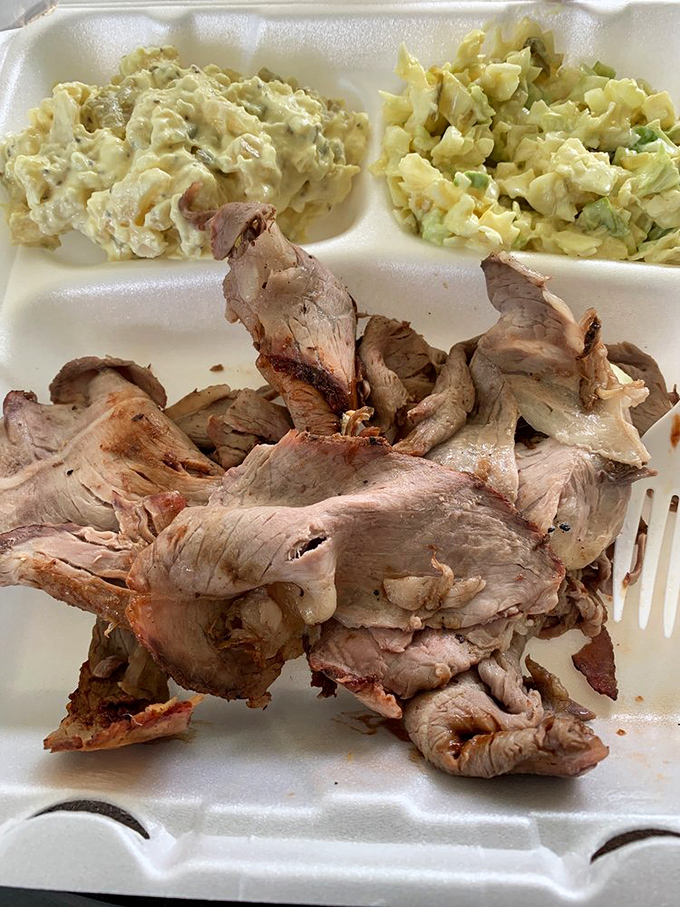 The pulled beef doesn't just fall apart&mdash;it surrenders willingly to your fork after hours of slow-smoking. Those sides aren't playing around either.