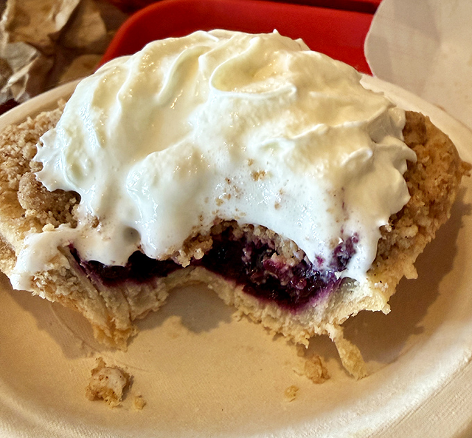 Blueberry crumble that captures Maine's favorite fruit in its most glorious form – sweet, tart, and topped with a cloud of whipped cream.