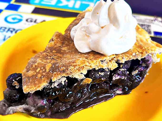 Berry pie bursting with juicy evidence that nature's candy needs minimal intervention. Just add crust and prepare for bliss.