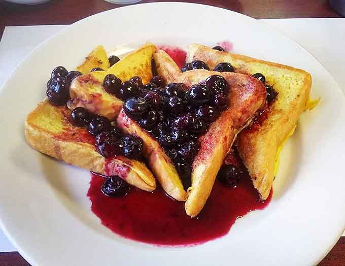 French toast becomes an art form when topped with blueberries that burst with every bite.