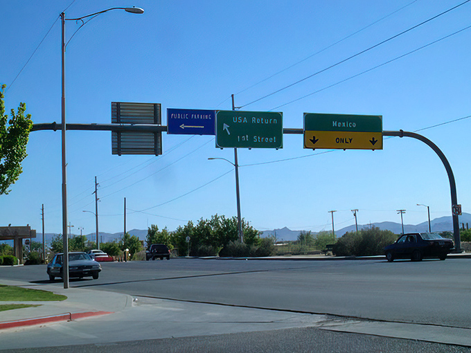 International adventures await just beyond these directional signs, where cultures blend and border towns buzz with unique energy.