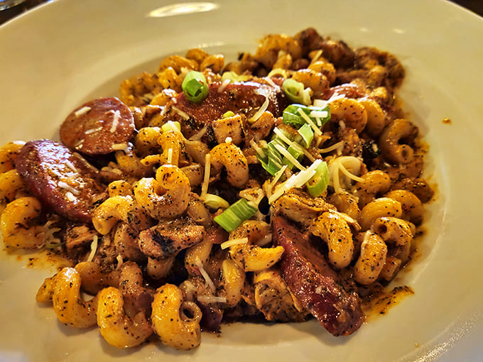 A spicy symphony of sausage and pasta that would make New Orleans proud – this dish doesn't whisper its flavors, it belts them out like a jazz solo.