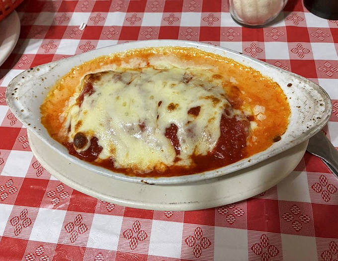 Bubbling cheese blankets this hearty cannelloni &ndash; a dish that makes you want to hug whoever invented the combination of pasta and sauce.