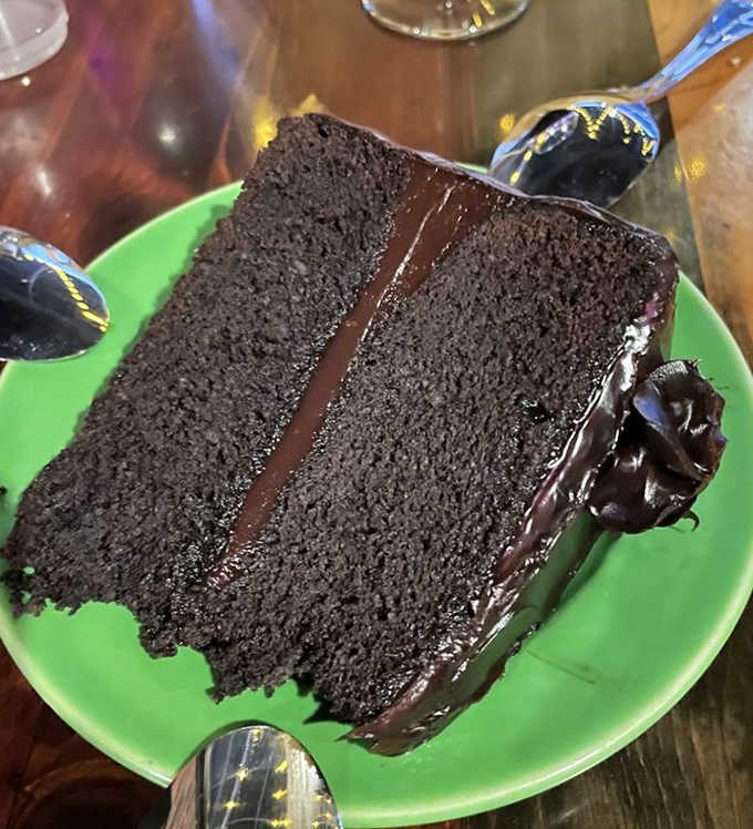 This towering slice of chocolate cake could easily serve two, but we won't judge if you tackle it solo with determination and joy.