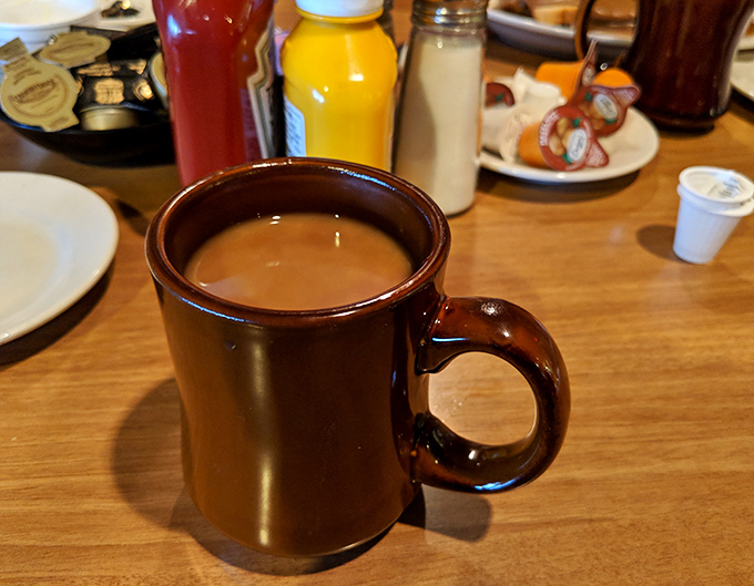 Coffee served in a mug substantial enough to make fancy latte art weep with inadequacy &ndash; the perfect donut wingman.