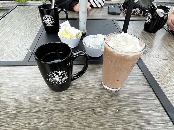 Morning rituals: Strong coffee in branded mugs alongside decadent milkshakes that blur the line between beverage and dessert.