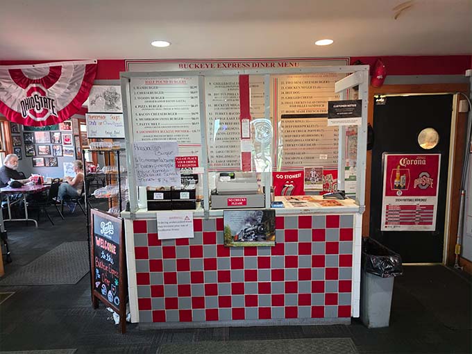 The counter area showcases the classic red and white checkered pattern that defines the diner's nostalgic aesthetic.