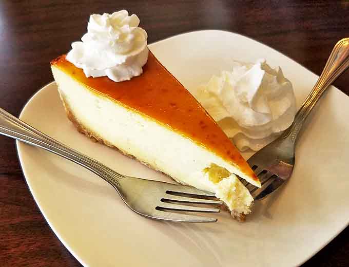 The Cr&egrave;me Br&ucirc;l&eacute;e Cheesecake combines two classic desserts into one indulgent finale that's worth saving room for.