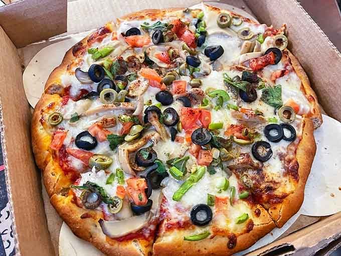 This isn't just pizza &ndash; it's a garden of toppings on a perfectly crisp crust that makes chain delivery seem like a sad compromise.