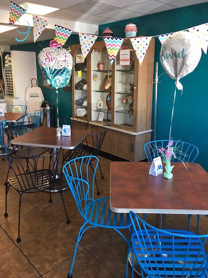 The dining area: where calories don't count and sugar-induced happiness is the only currency that matters. Blue chairs included for post-dessert recovery.