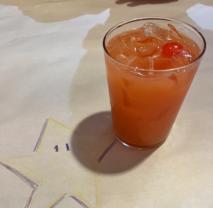 This sunset-colored Hurricane isn't just a cocktail &ndash; it's liquid sunshine with a kick that transports you straight to Bourbon Street.