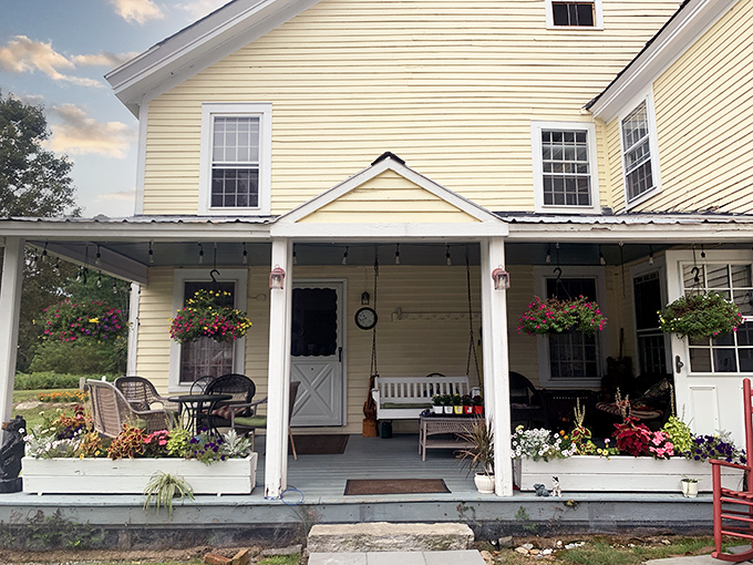 This farmstand's weathered wooden charm and hanging flower baskets showcase Vermont's agricultural roots with picture-perfect authenticity.