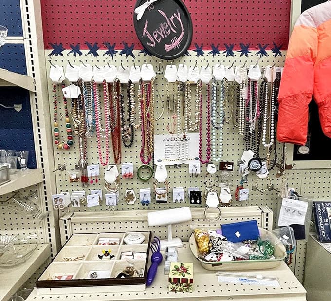 Necklaces dangle like colorful memories, each bead and pendant once chosen to complement someone's special outfit or mark a celebration.