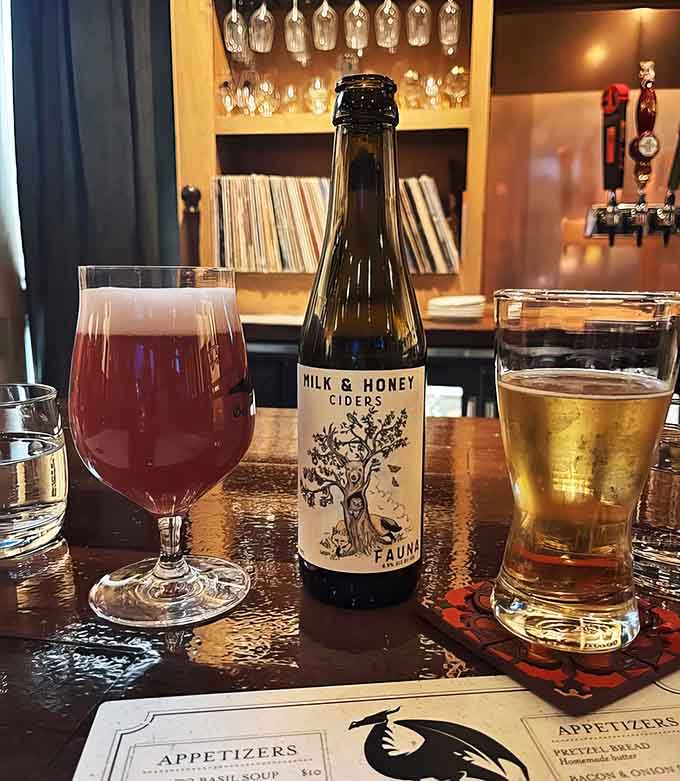 Local ciders and craft beers line up like liquid happiness, ready to complement whatever delicious decision you're about to make.