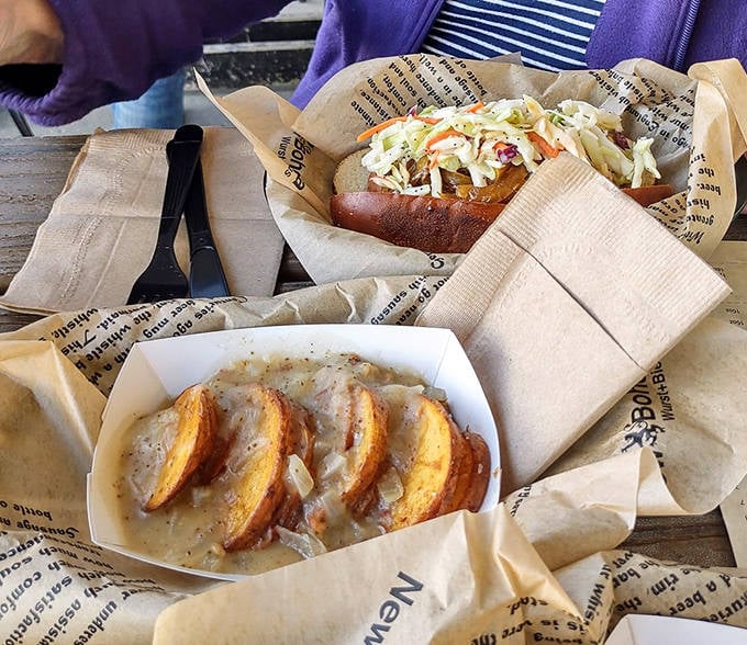 A study in contrasts: hearty German potato salad alongside a chicken apple wurst that brings sweet and savory together in perfect harmony.