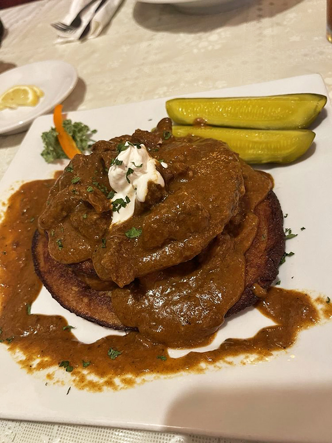 The Gypsy Potato Pancake &ndash; where a humble spud transforms into a plate-sized canvas for savory beef, sweet peppers, and tangy sour cream.