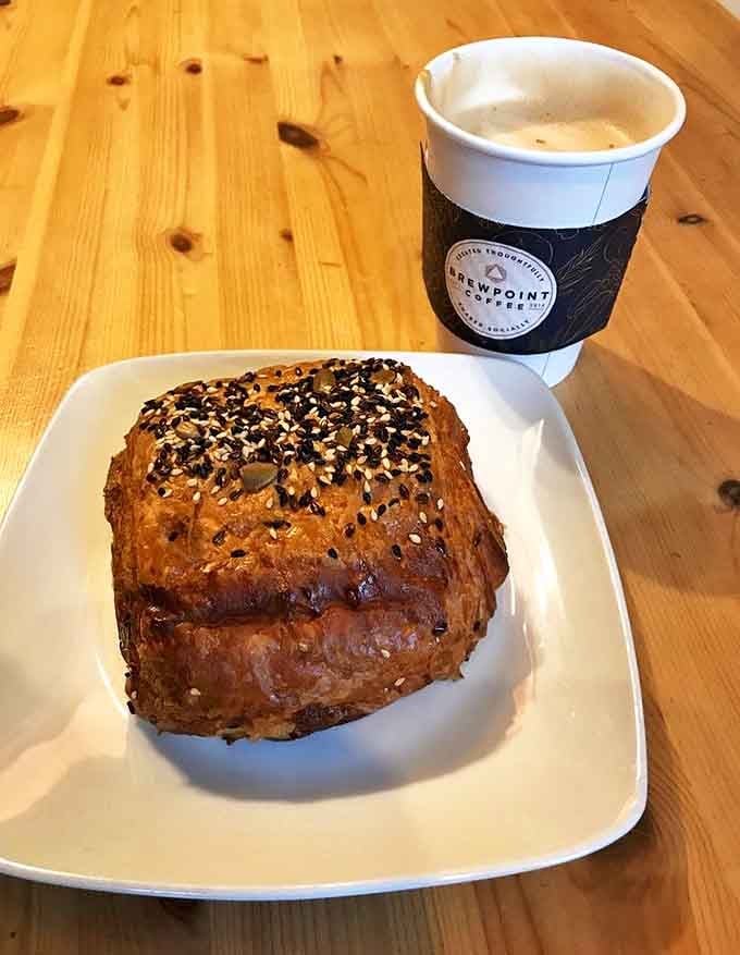 This ham and cheese croissant paired with cappuccino is basically a French vacation without the jet lag.
