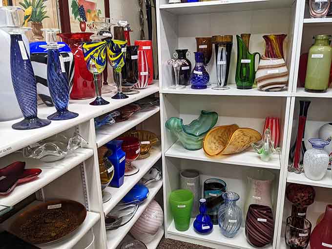 Colored glassware creates a rainbow of vintage beauty, each piece a testament to craftsmanship that's become increasingly rare.