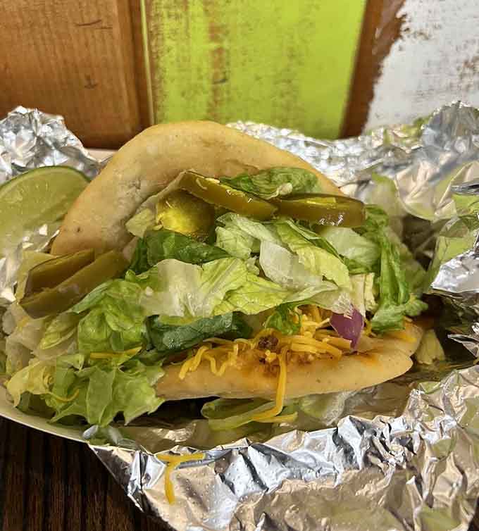 The fry bread taco showcases creative menu thinking, piling fresh ingredients high on a unique and delicious base.