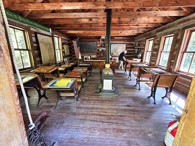 Inside the schoolhouse, wooden desks wait patiently for students who'll never return. Can't you just hear the chalk scratching against the blackboard?