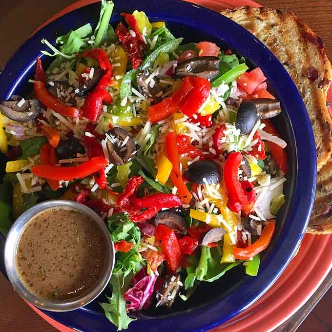 That Italian Garden Salad isn't playing around with its colorful peppers, fresh greens, and generous cheese topping.