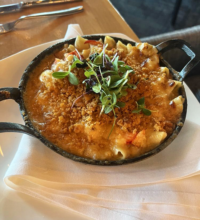 Lobster mac and cheese that redefines comfort food &ndash; generous chunks of sweet Maine lobster nestled in creamy, cheesy goodness.