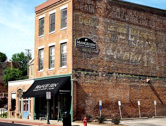 Mangelsen's weathered brick exterior tells you this place has stories. Ghost signs whisper of businesses past while present-day shoppers browse within.